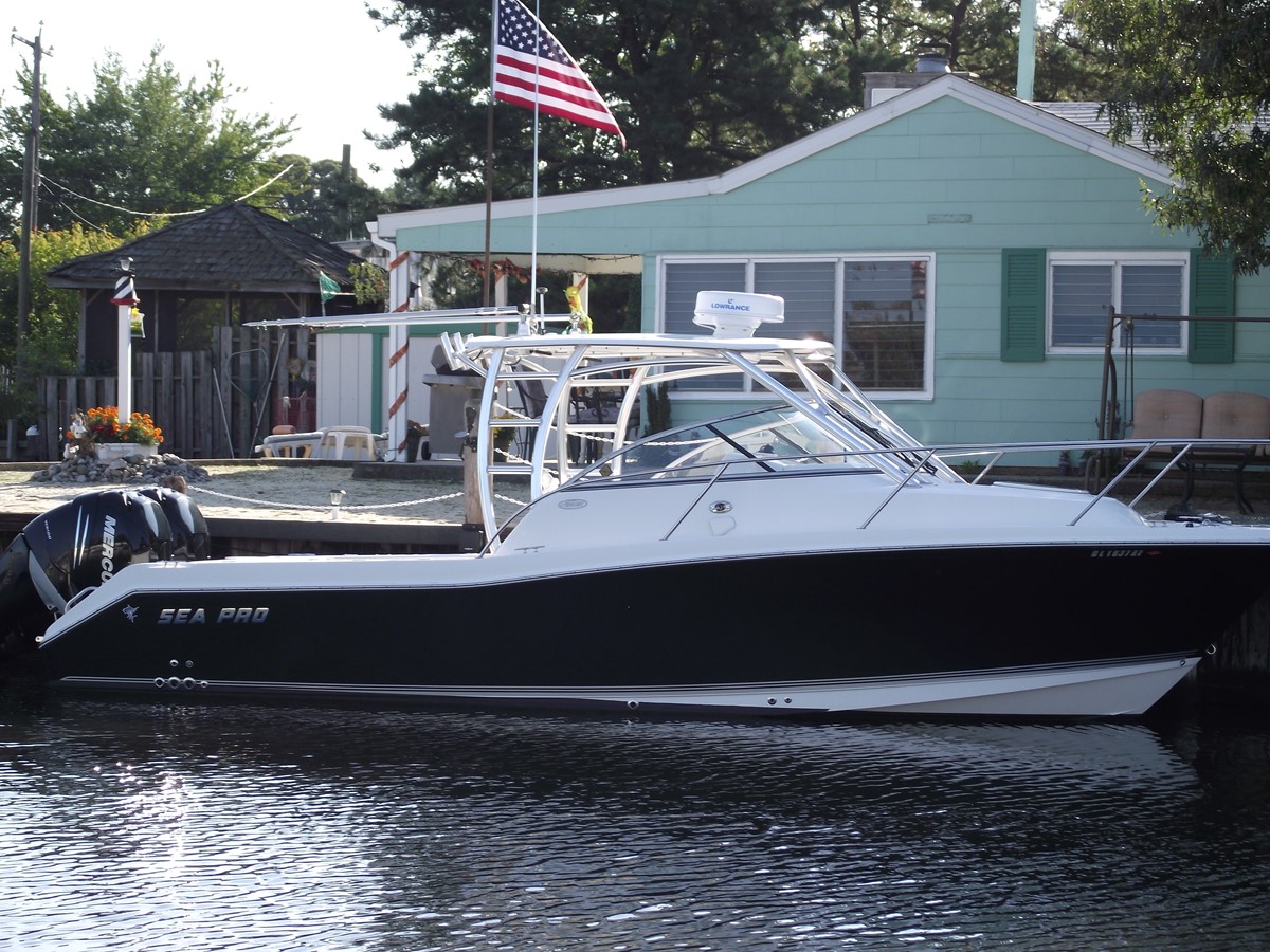 TINMAN Sport Fisherman SEA PRO 27' 2009 | YATCO